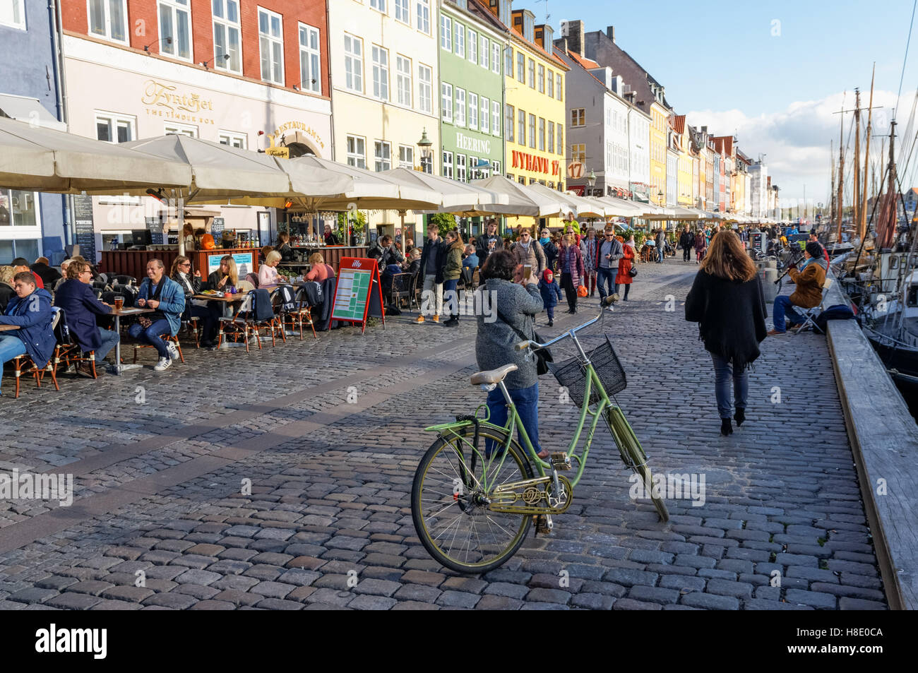 Tourists at Nyhavn canal in Copenhagen, Denmark Stock Photo - Alamy