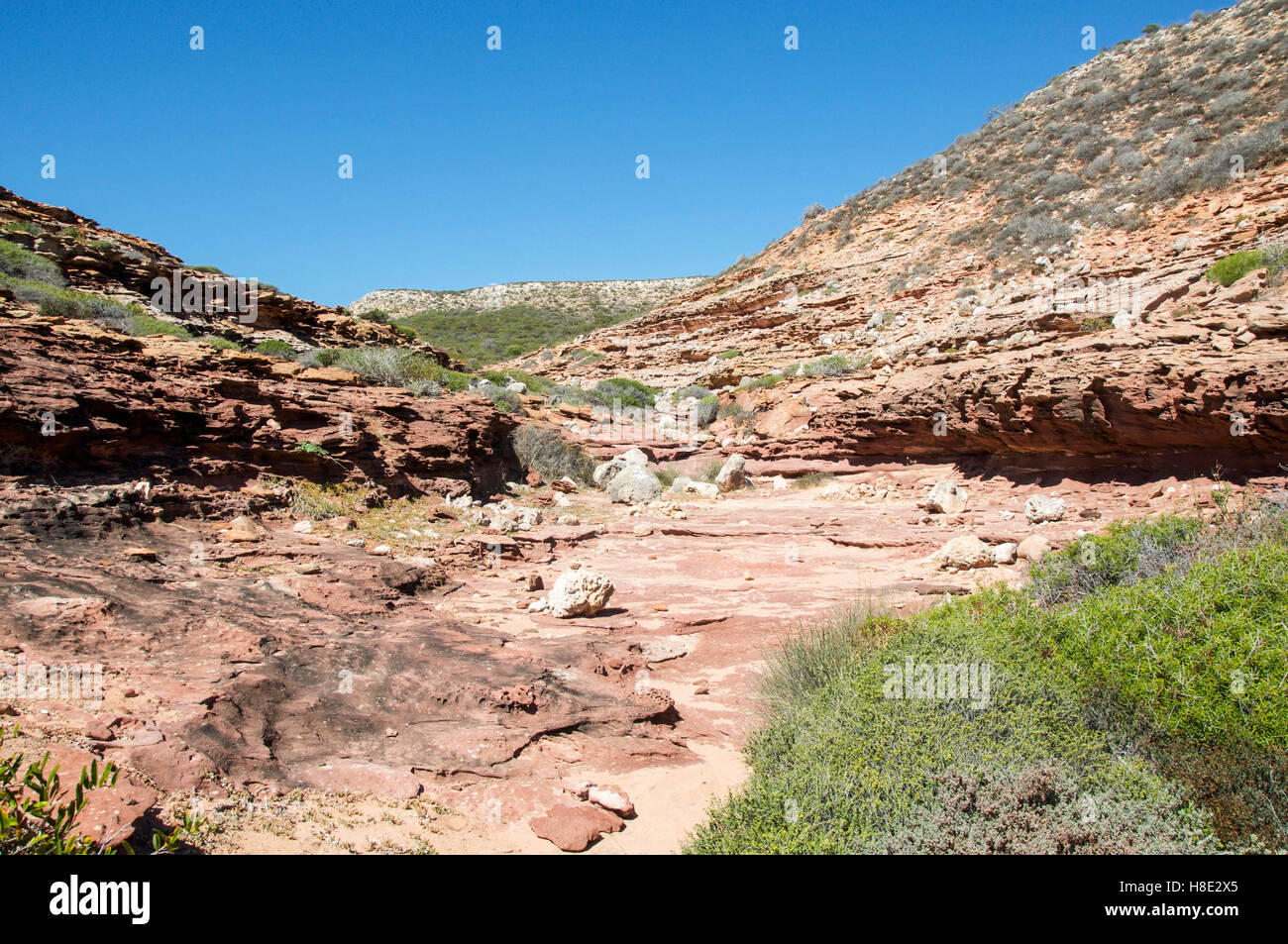 Pot Alley landscape with rugged, eroded red sandstone rock formations ...