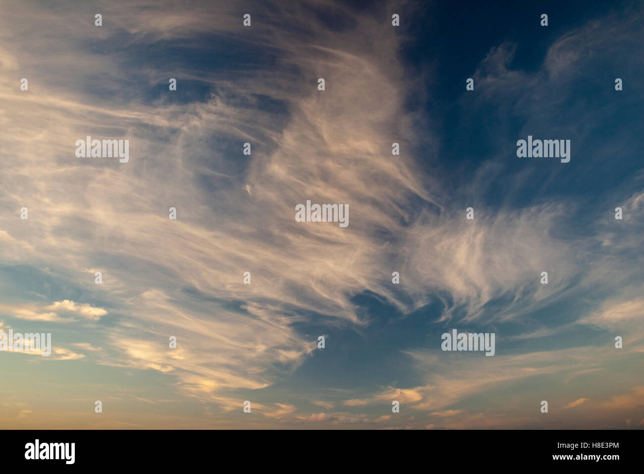 Sun setting clouds Stock Photo - Alamy