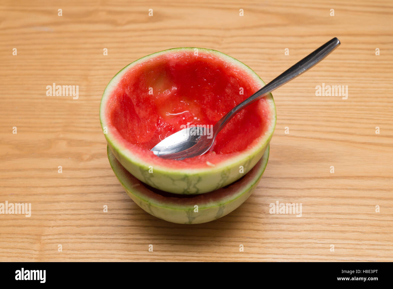 watermelon have been eaten with a spoon Stock Photo - Alamy