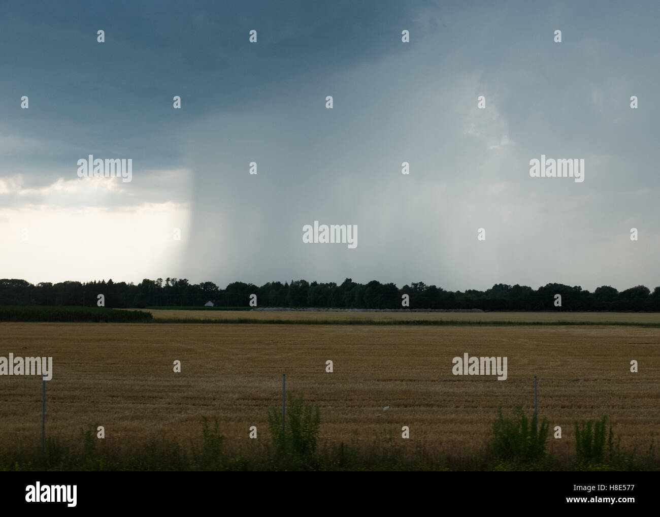 Distant rainstorm in the countryside, Bavaria, Germany Stock Photo - Alamy