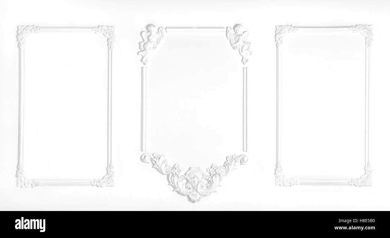 White wall decorated with stucco and molding in the style of ...