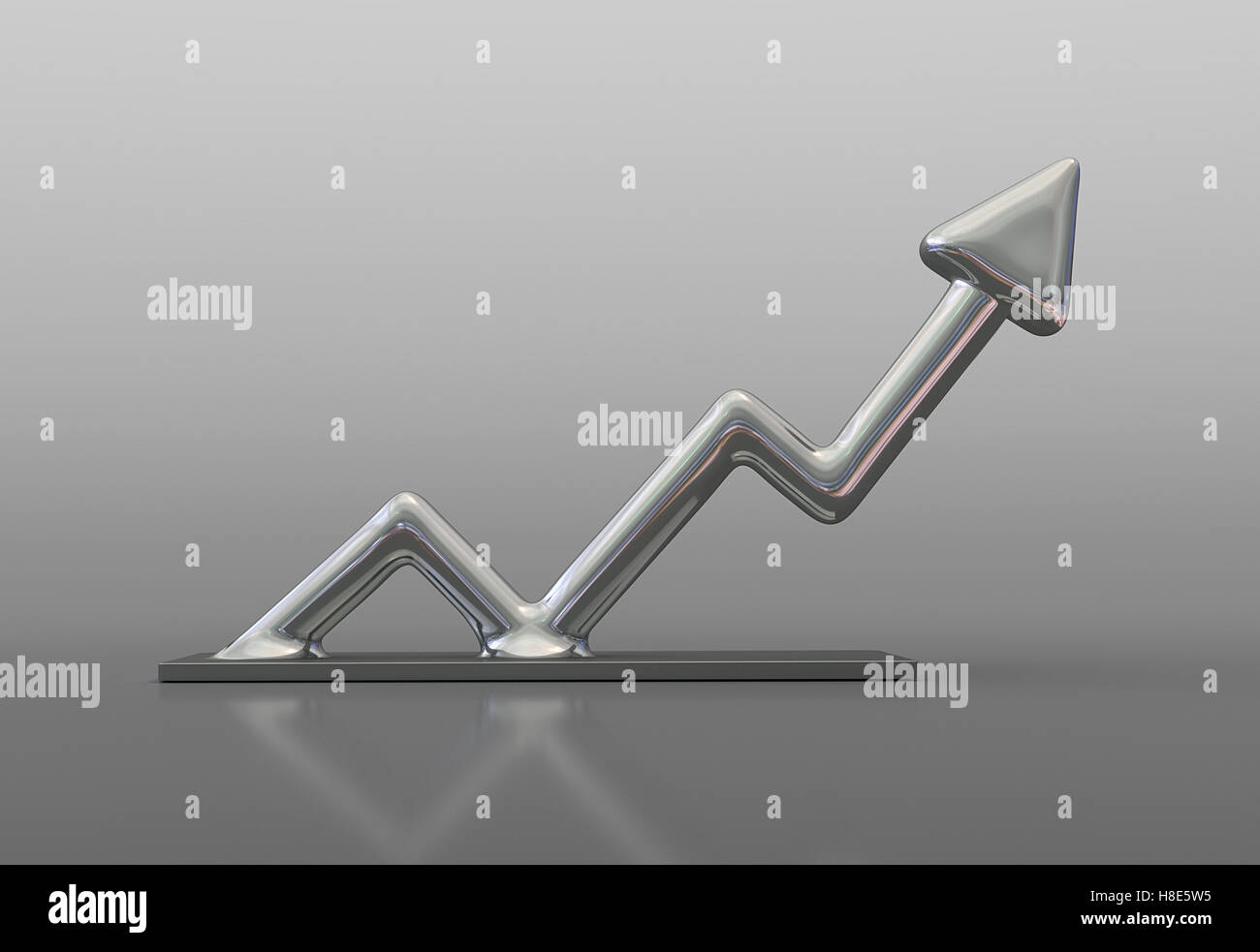 A metallic arrow grows upwards Stock Photo - Alamy