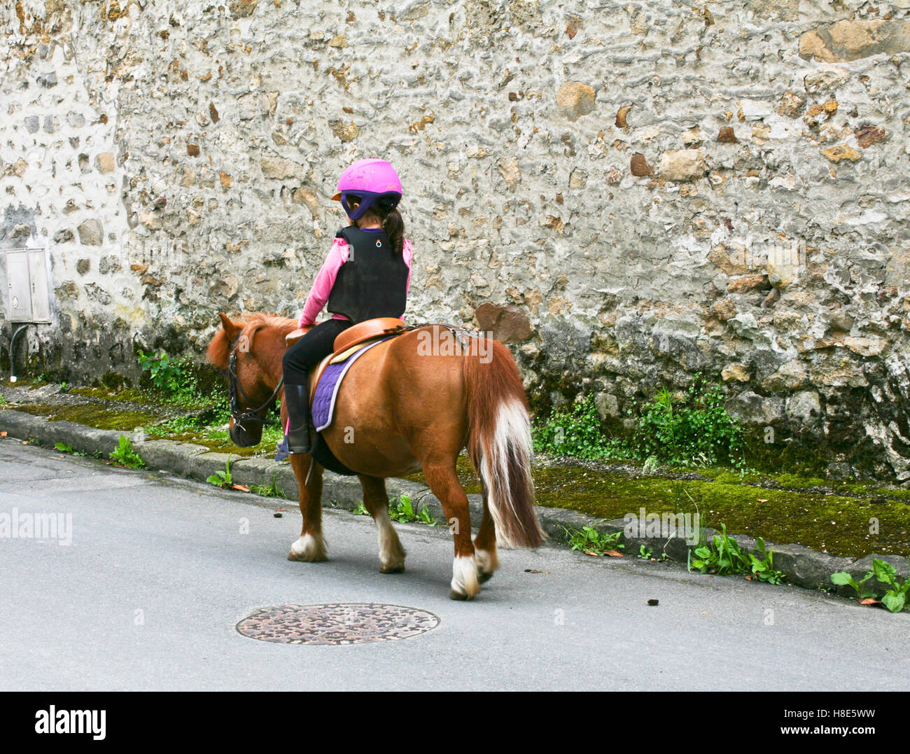Child Riding Pony High Resolution Stock Photography and Images - Alamy