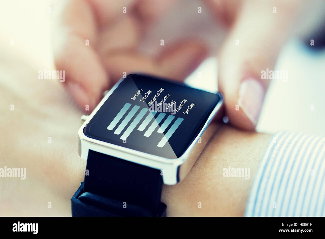 close up of hands with chart on smartwatch screen Stock Photo - Alamy
