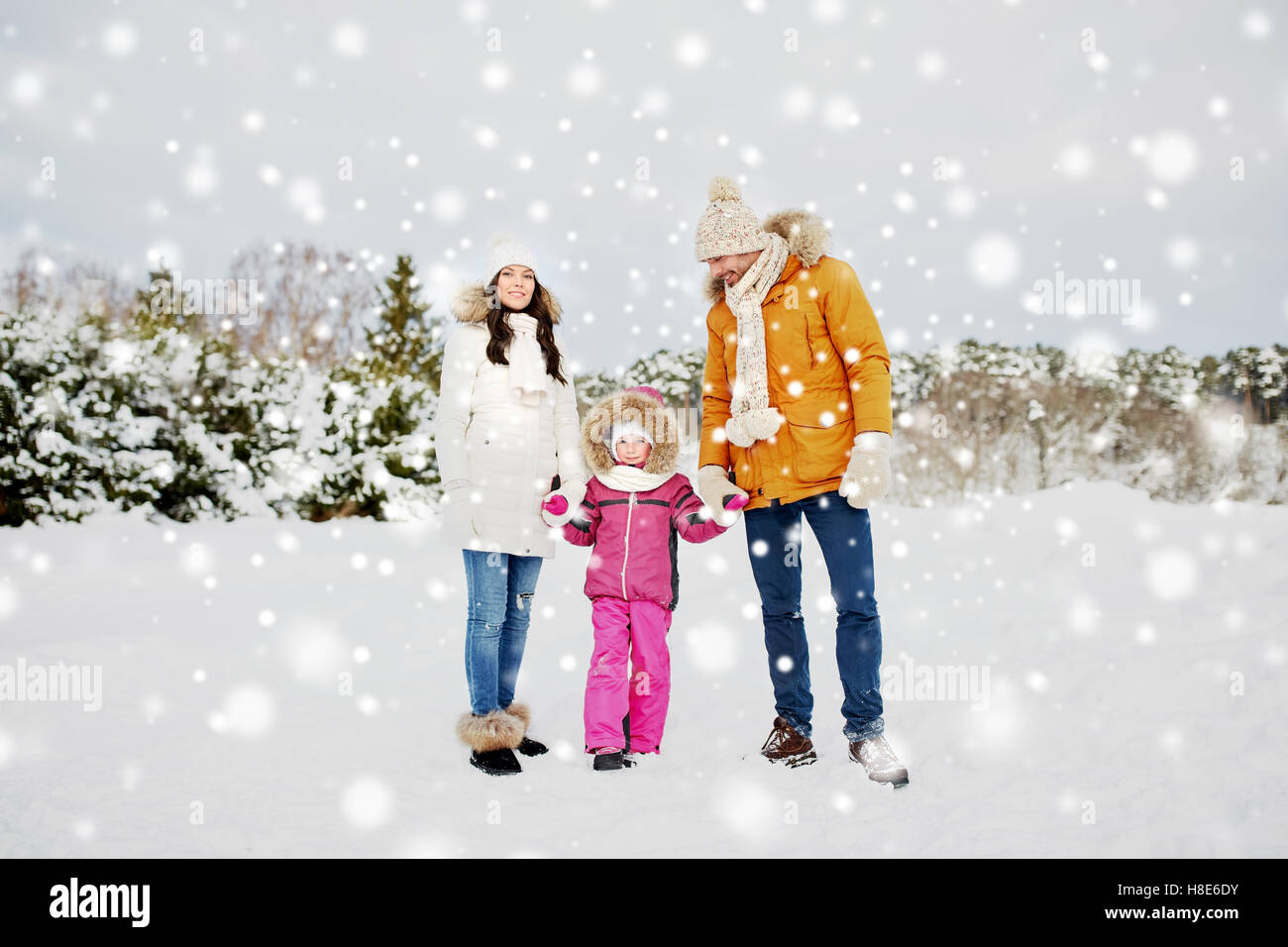 happy family with child in winter clothes outdoors Stock Photo - Alamy