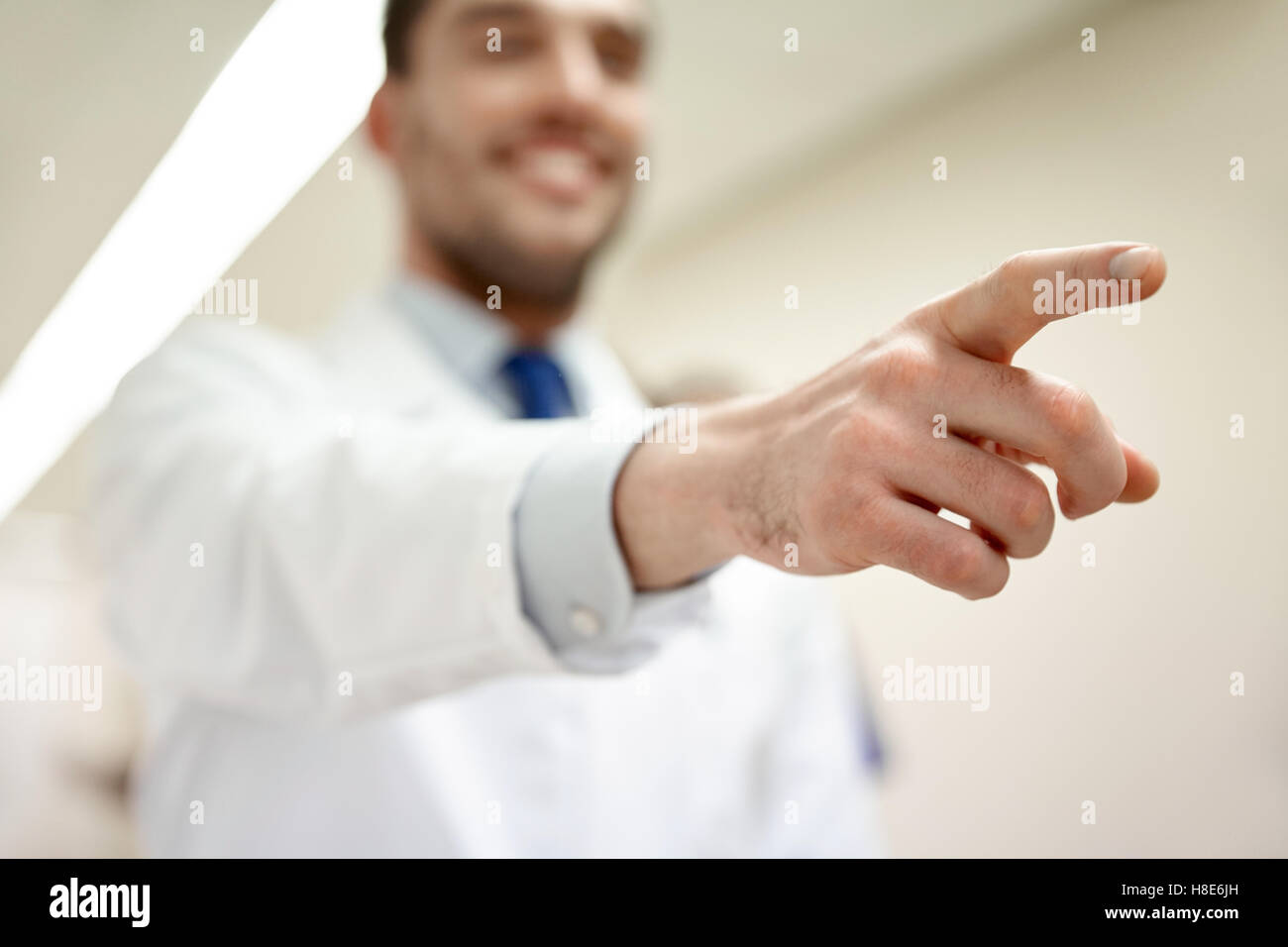 close up of doctor pointing finger at hospital Stock Photo - Alamy