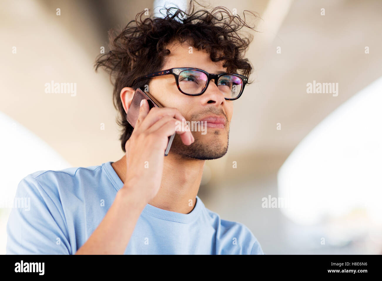 man with smartphone calling on city street Stock Photo - Alamy