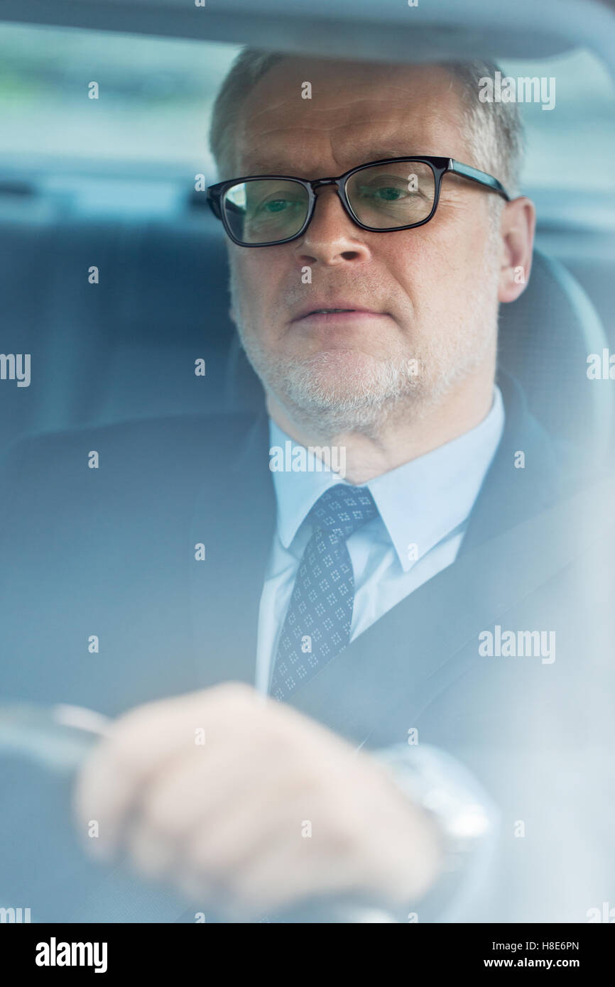 senior businessman driving car Stock Photo - Alamy