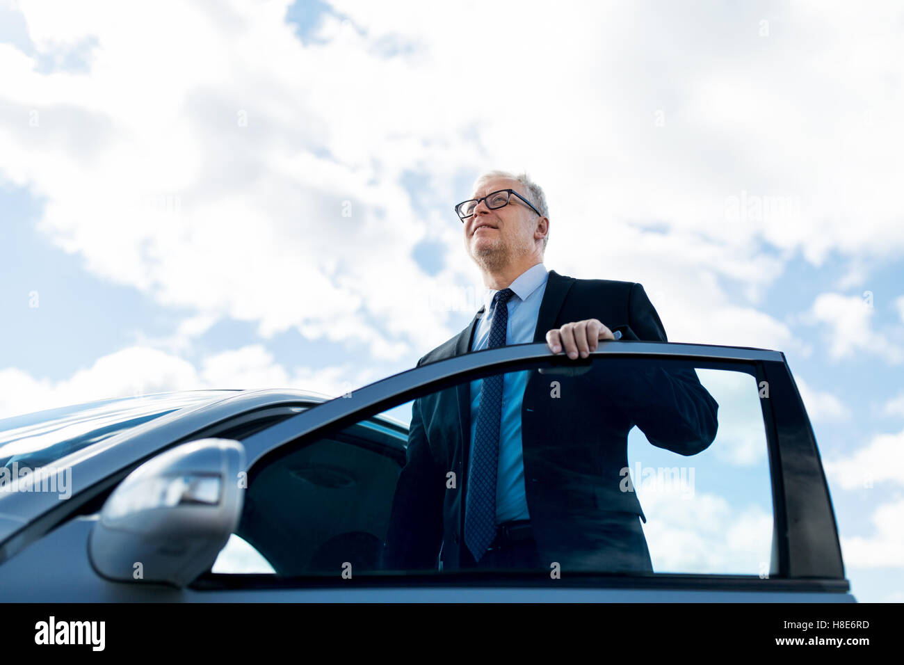 Man getting into car hi-res stock photography and images - Alamy