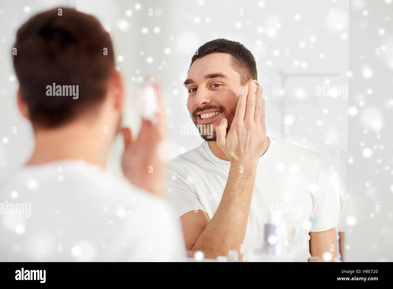 happy man applying shaving foam at bathroom mirror Stock Photo - Alamy