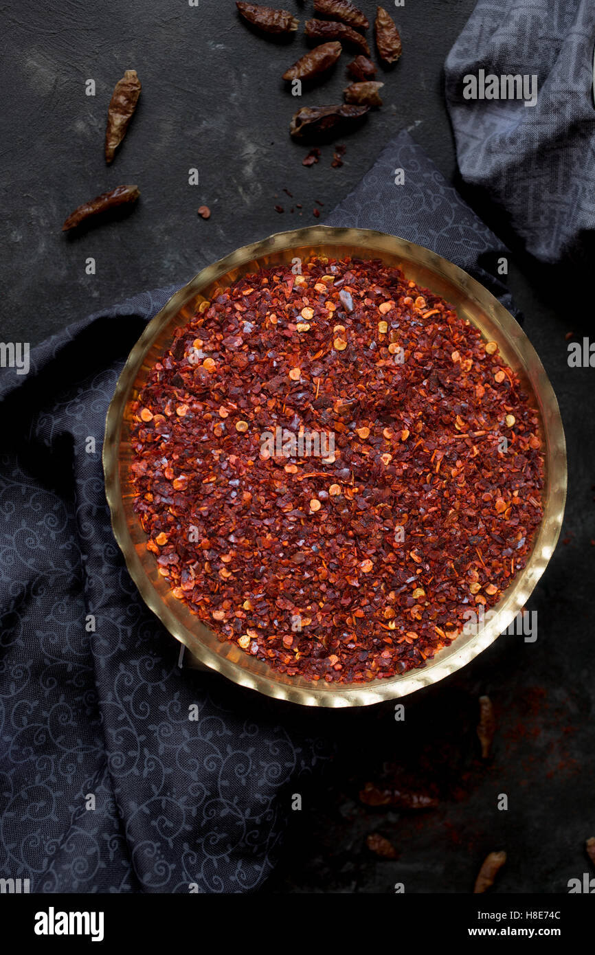 Chilli spices in a bowl Stock Photo - Alamy