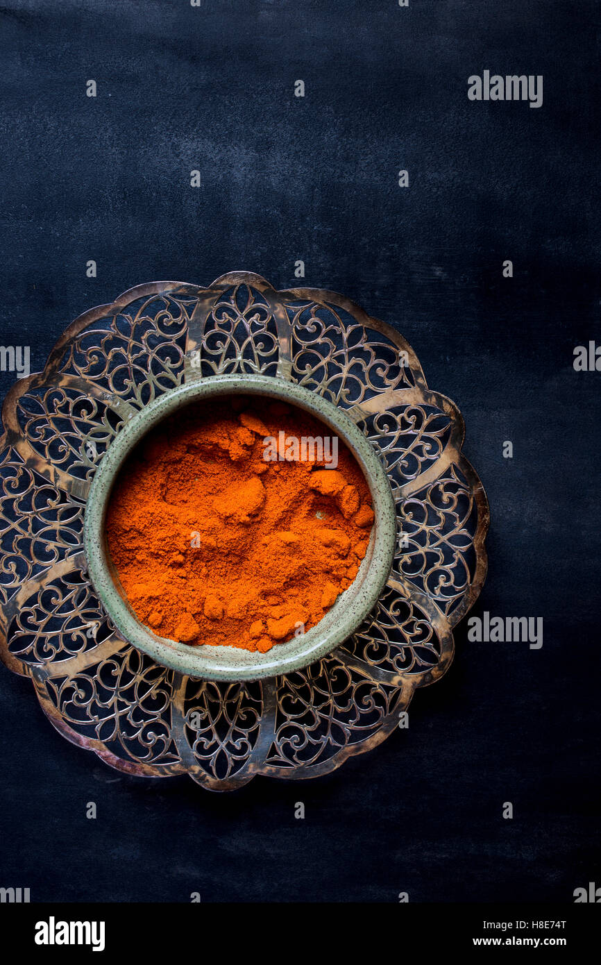 Chilli spices in a bowl Stock Photo - Alamy