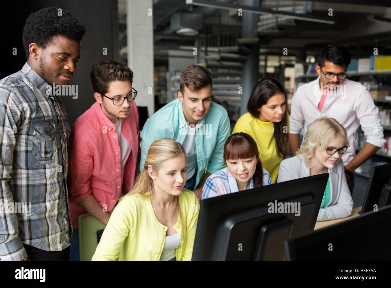 international students with computers at library Stock Photo - Alamy