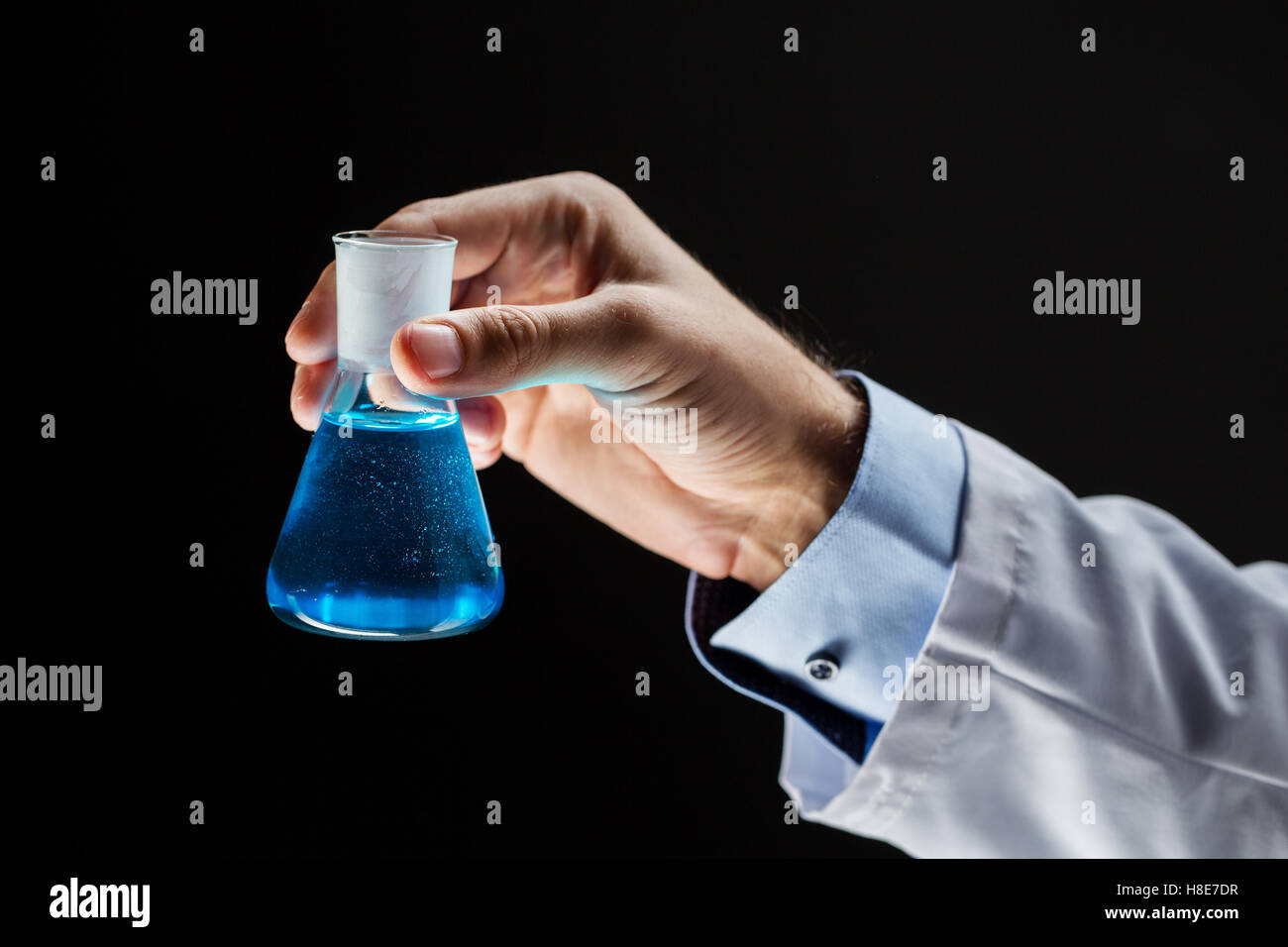 close up of scientist holding flask with chemical Stock Photo - Alamy