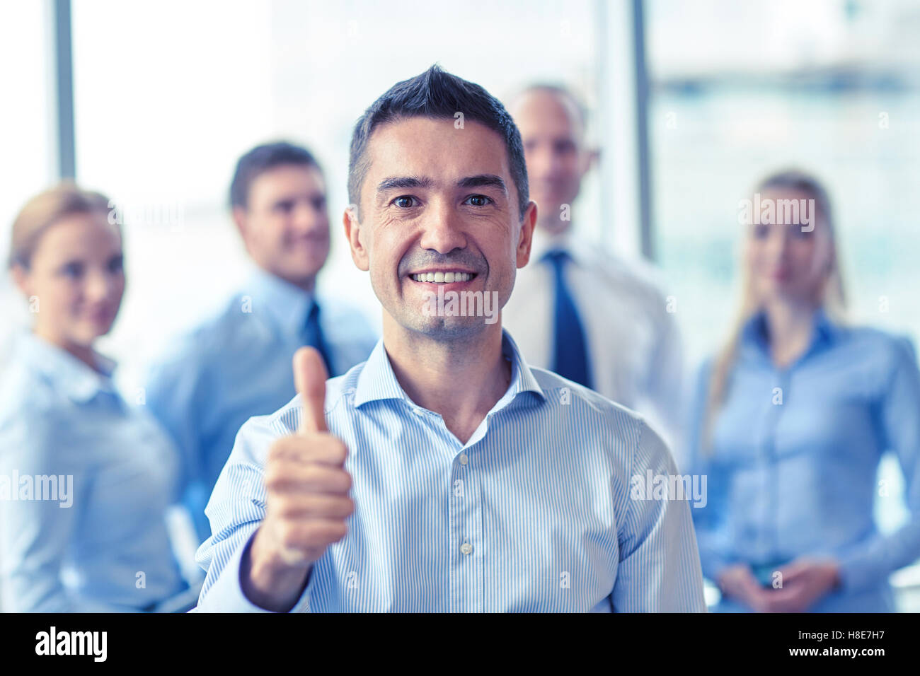 Entrepreneurs team thumbs up hi-res stock photography and images - Alamy