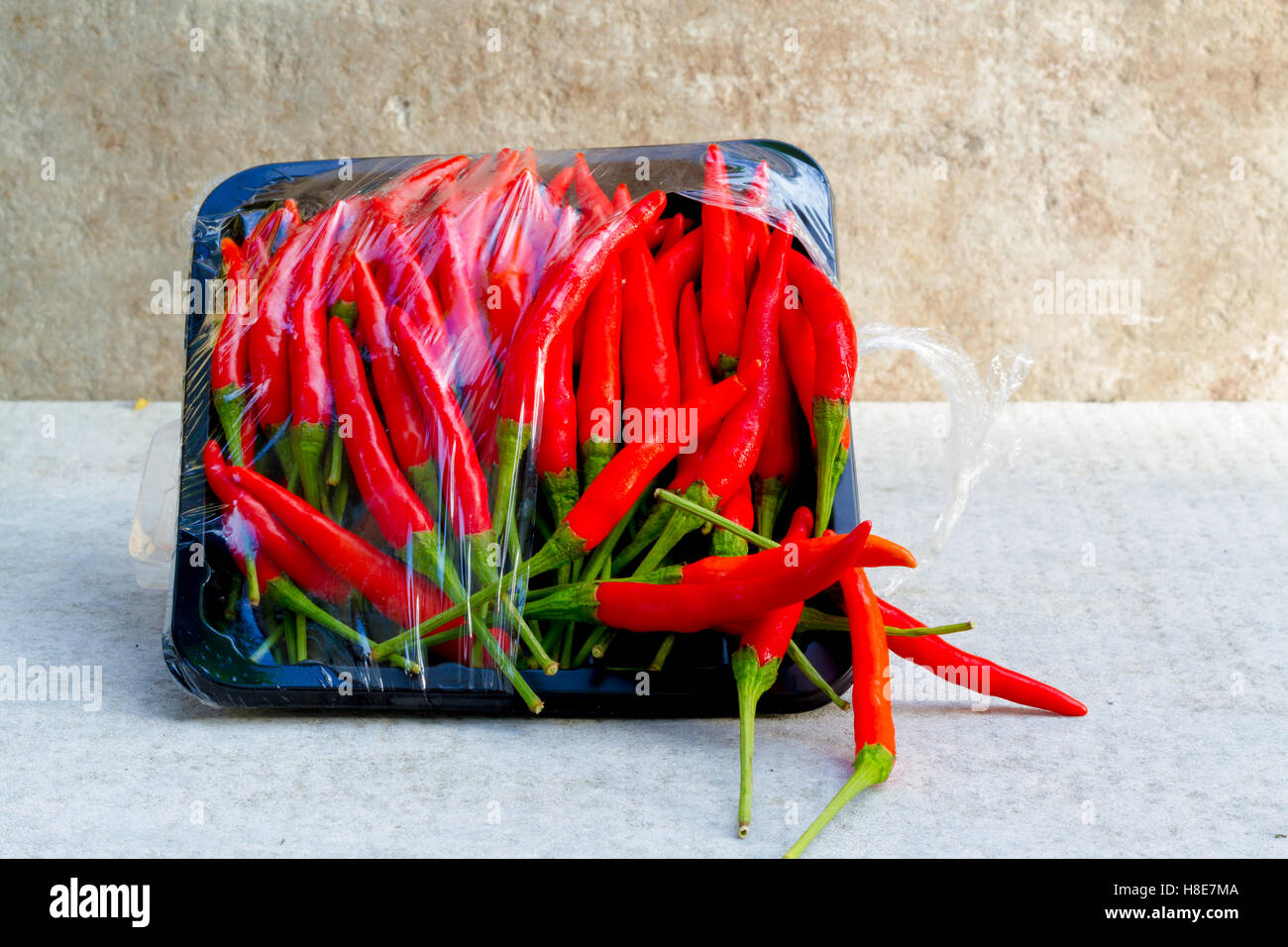 hot red chili or chili peppers red hot on floor background Stock Photo ...