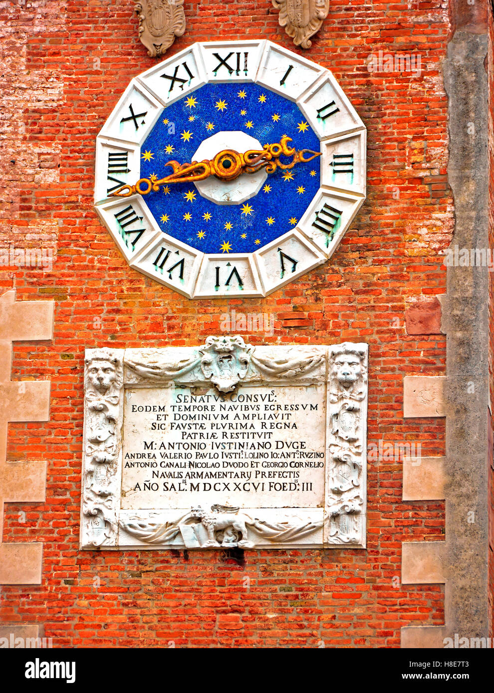 Venice Arsenal Museum blue faced wall clock Stock Photo - Alamy