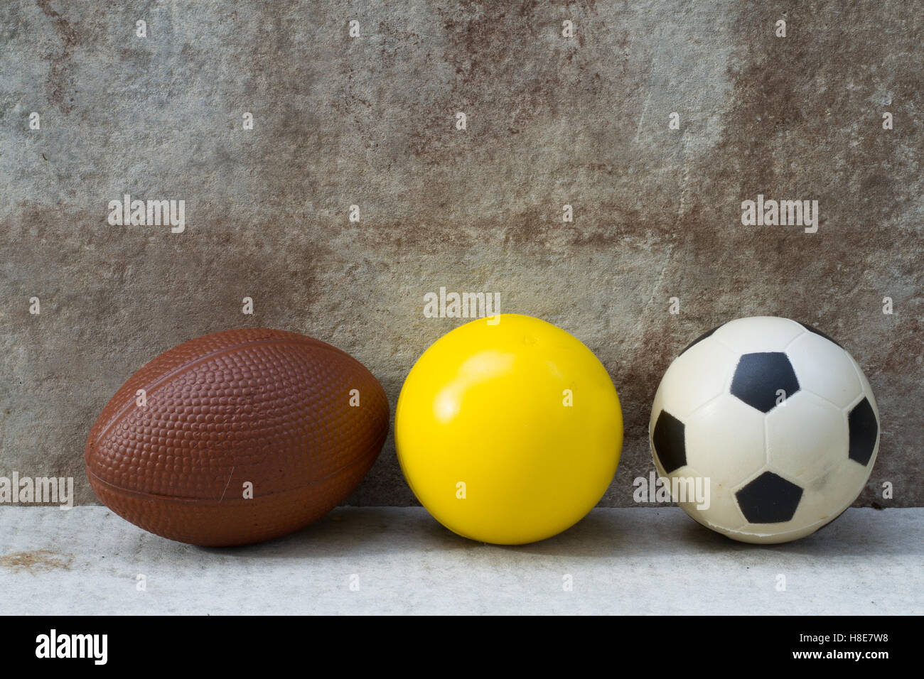 Ball on wall background Stock Photo - Alamy