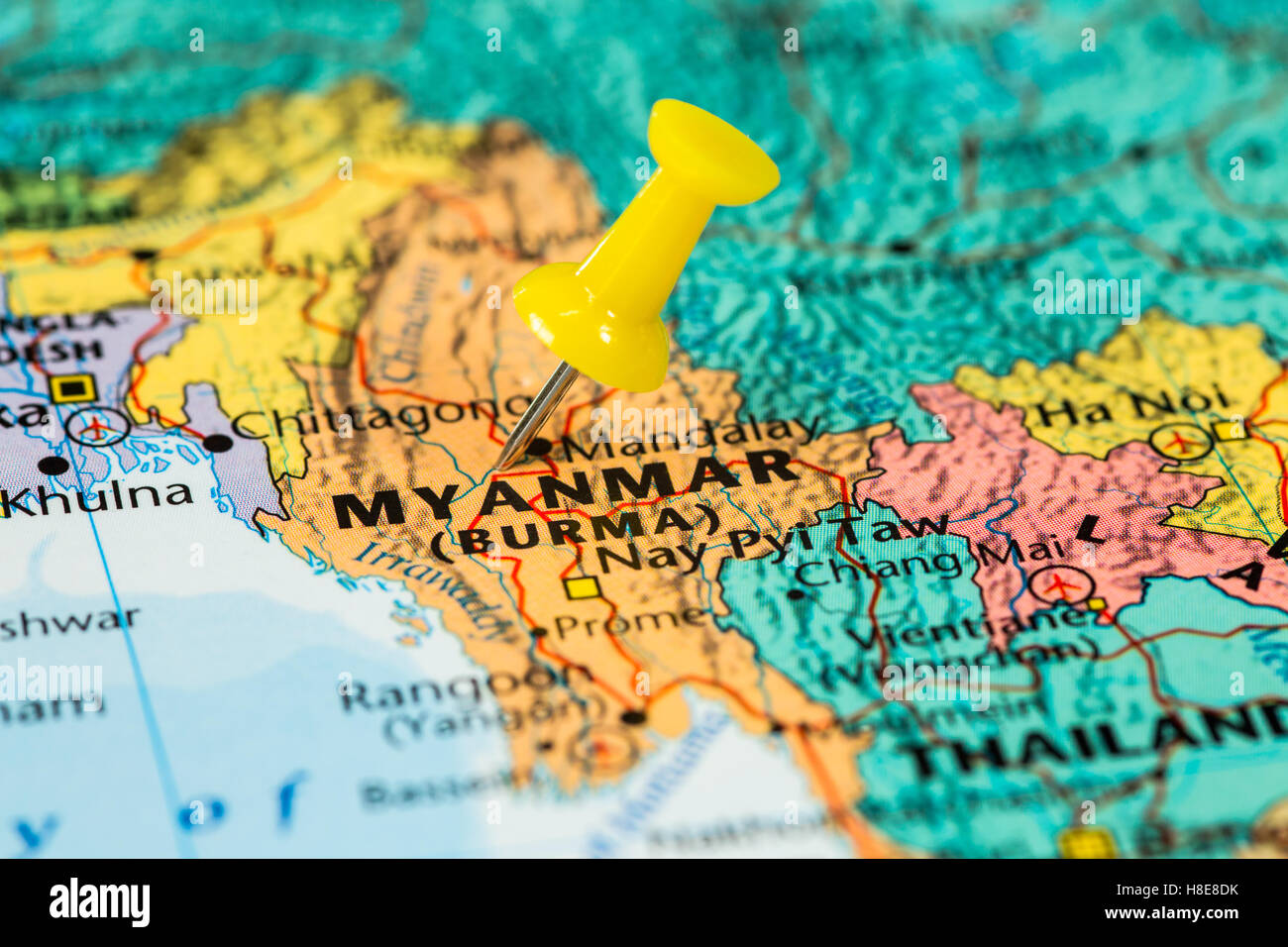 Map with a yellow pushpin stuck Stock Photo - Alamy