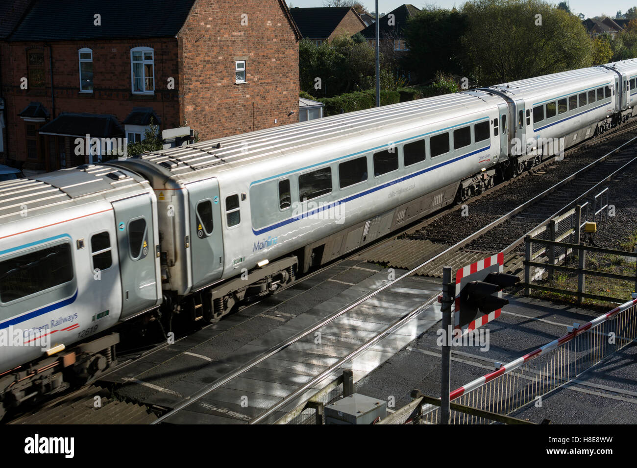 Chiltern Railways Mainline train at Bentley Heath level crossing, West ...
