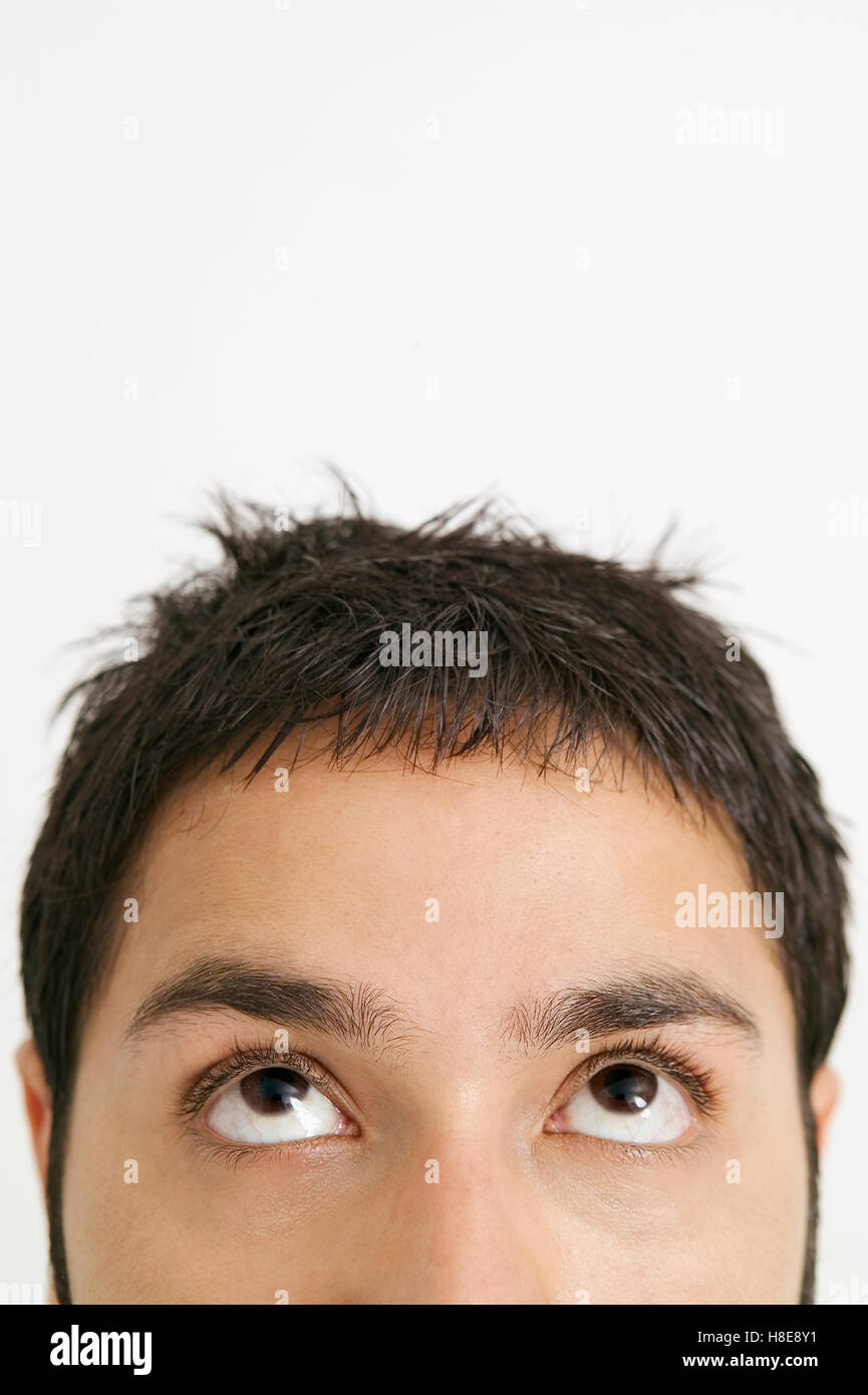 Closeup portrait of man with eyes looking up Stock Photo - Alamy