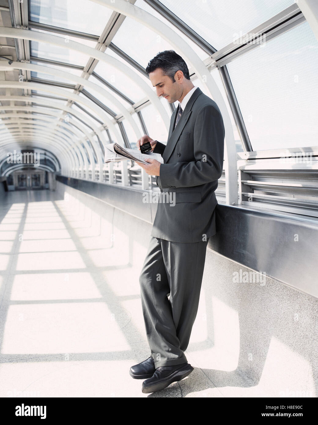 Man waiting for subway train Stock Photo - Alamy