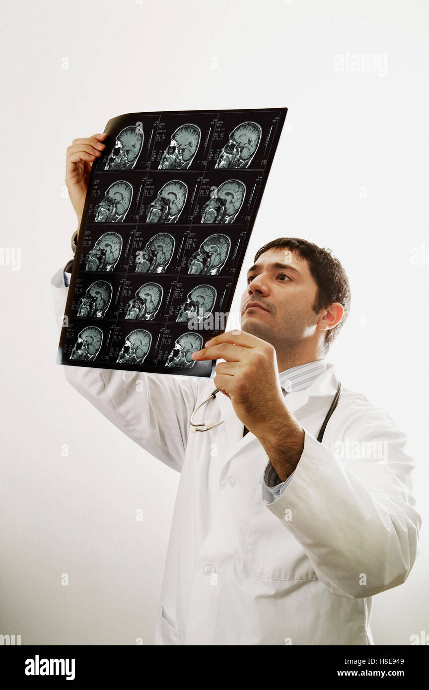 Doctor holding X-ray Stock Photo - Alamy