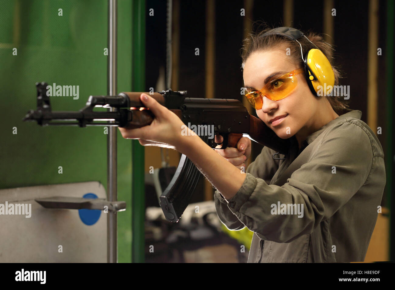 Shooting at the shooting range. The woman at the shooting range shot ...