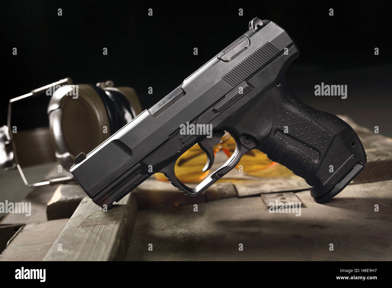 Glock pistol, cartridges and headphones protect ears Stock Photo - Alamy