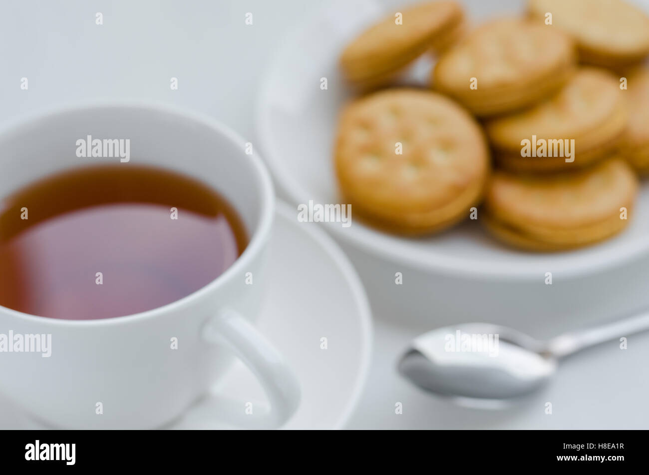Blurry Background of Sandwich Cream Crackers with Hot Tea for Breaking ...