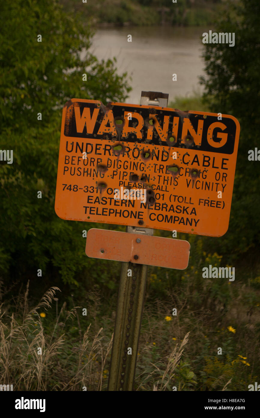 Underground cable warning sign hi-res stock photography and images - Alamy