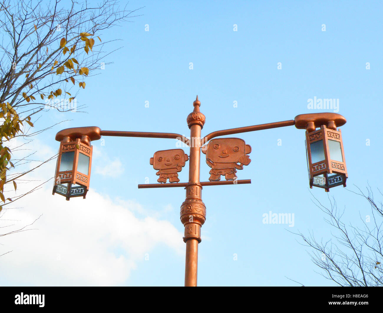 Cute Copper Color Traditional Style Street Lamp against the Autumn Blue ...