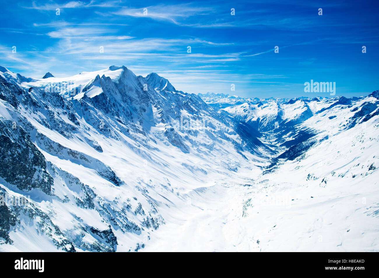 Aerial view of the Alps mountains in Switzerland. View from helicopter ...