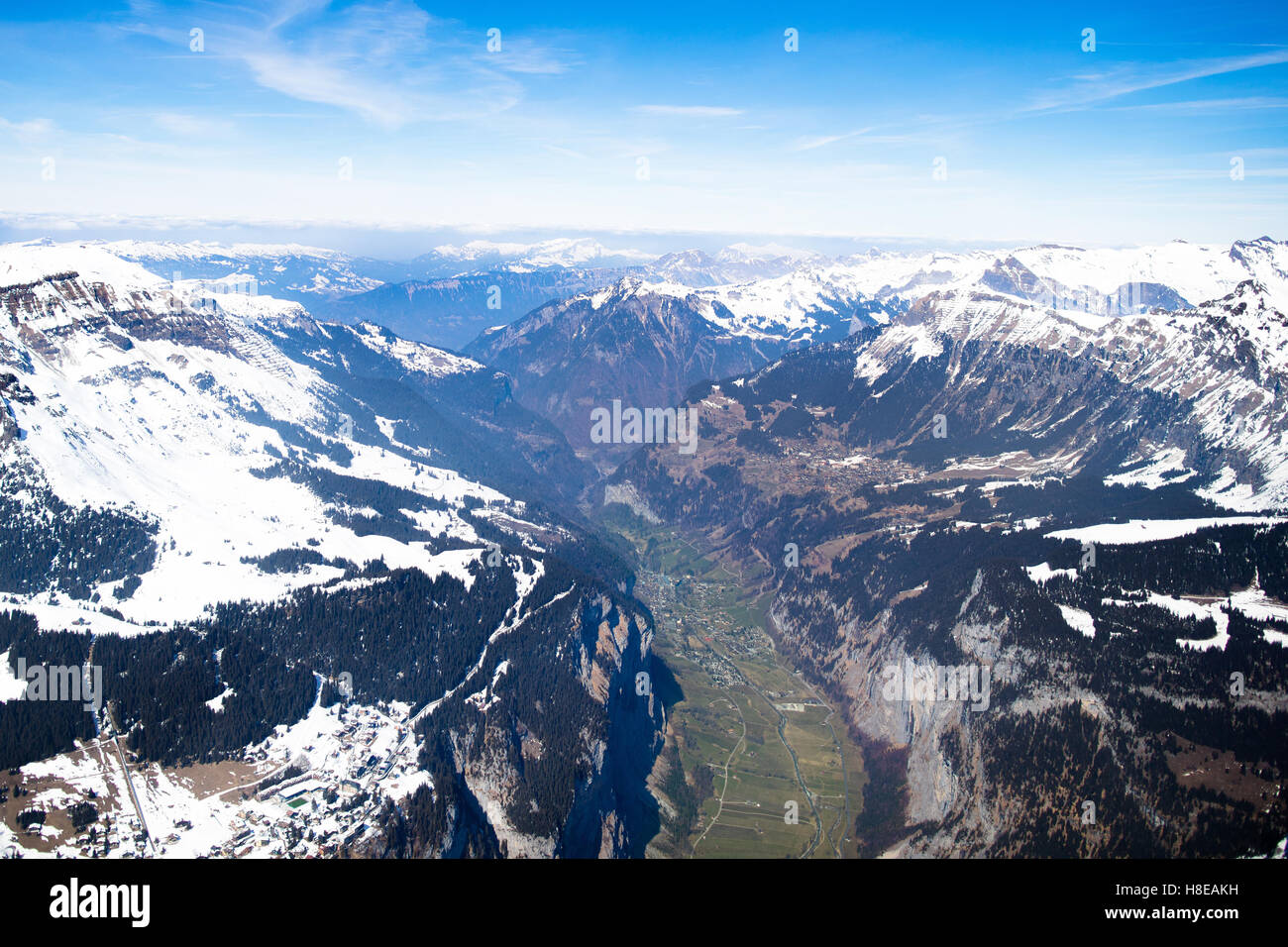 Aerial view of the Alps mountains in Switzerland. View from helicopter ...