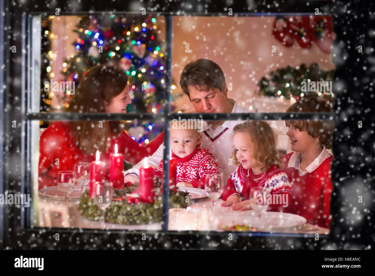 Big family with three children celebrating Christmas at home. Festive ...