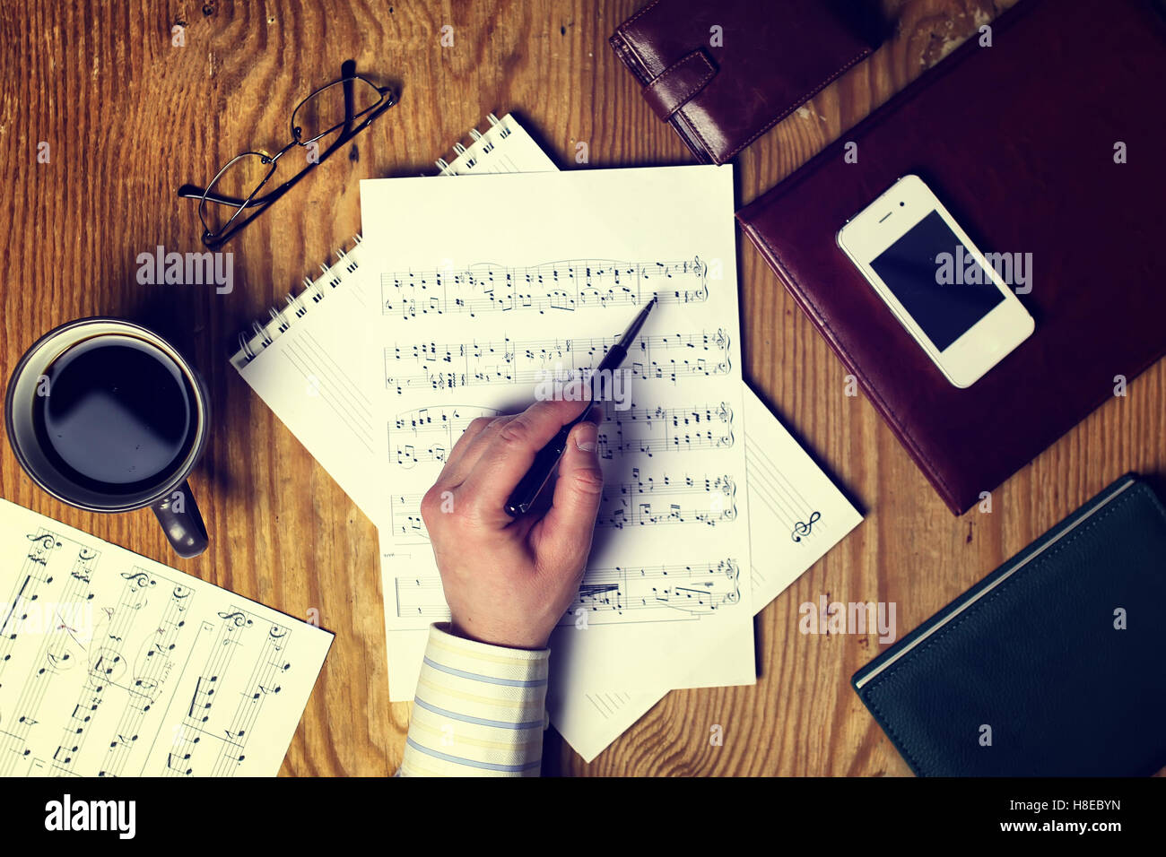 toned table write hand top view Stock Photo - Alamy