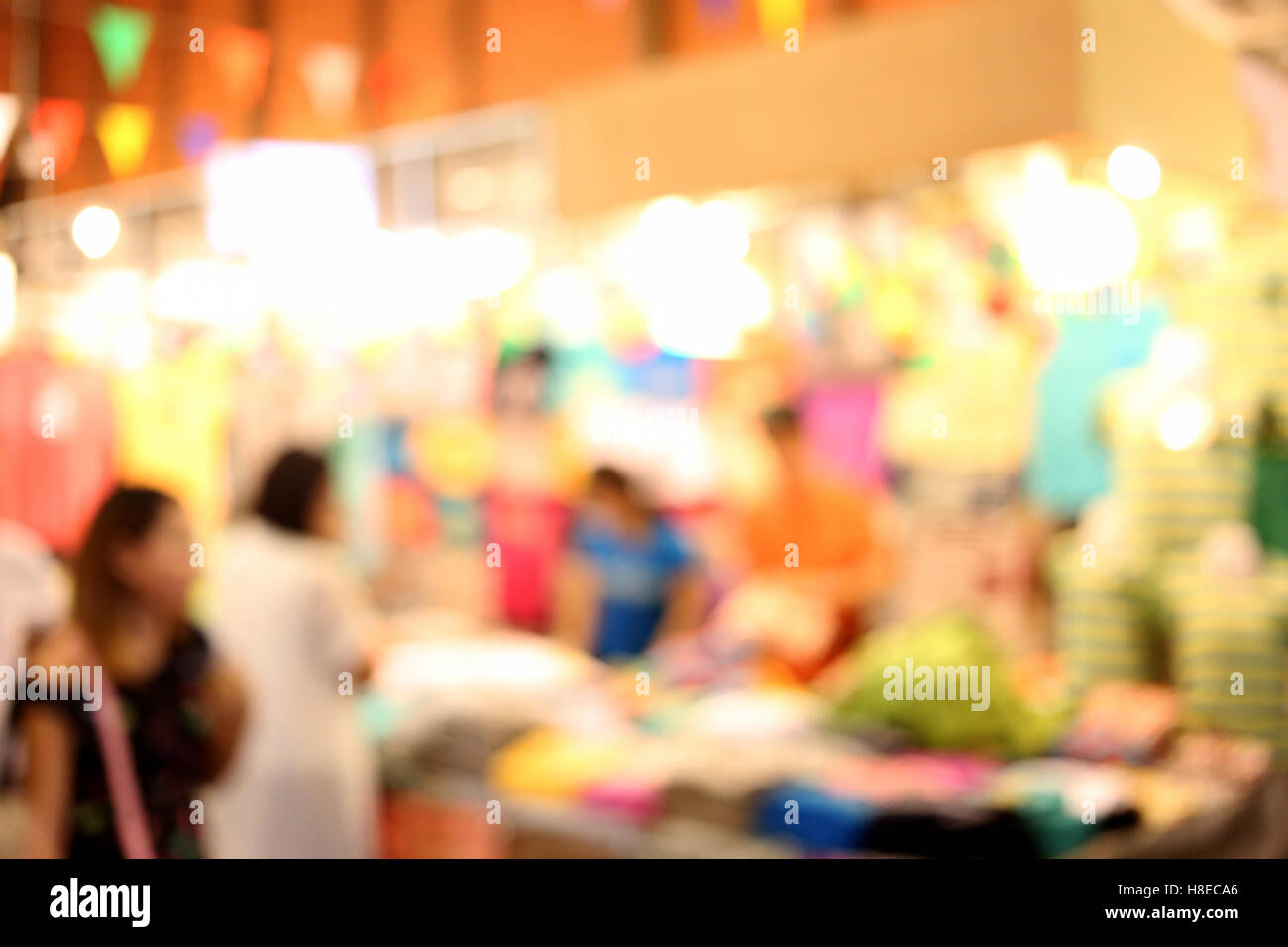 blur clothing store night and have lamp lighting for design background ...