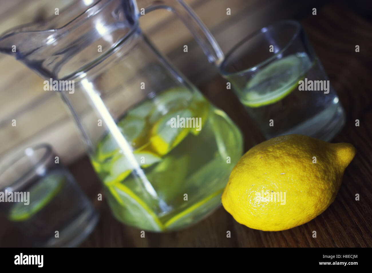 Lemonade in carafe lemon Stock Photo - Alamy