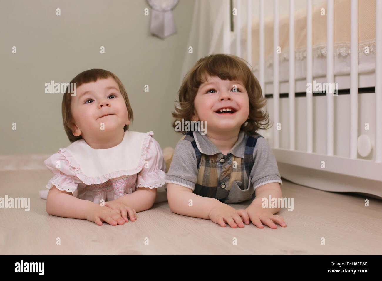 child near bed smiling Stock Photo - Alamy