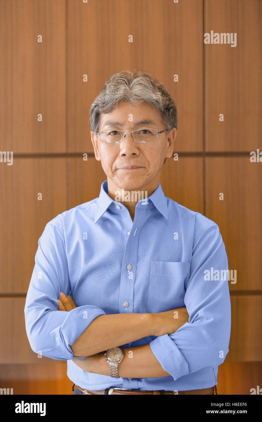 Senior man looking at her watch hi-res stock photography and images - Alamy