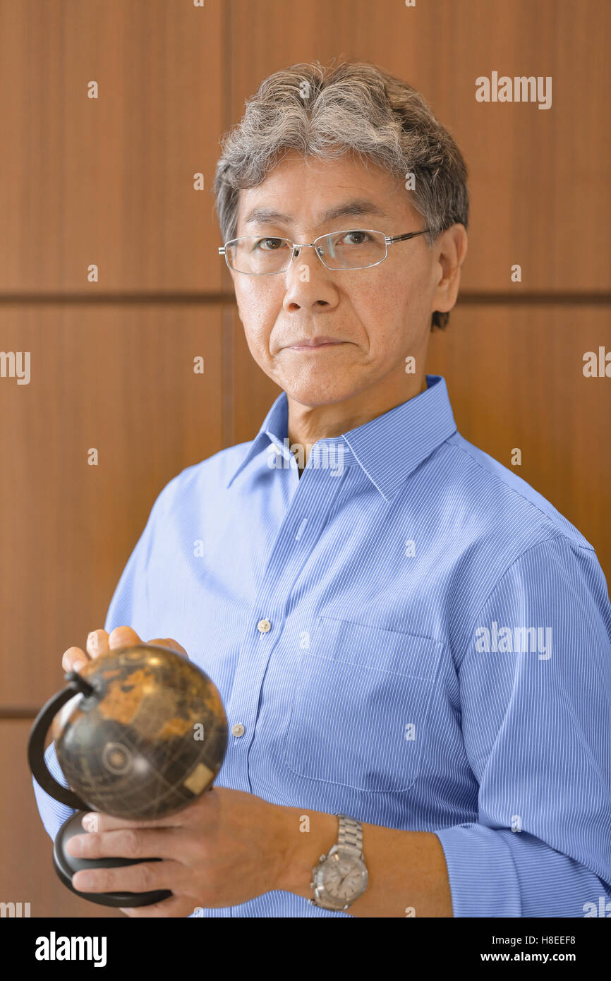 Fashionable Japanese senior man portrait Stock Photo - Alamy