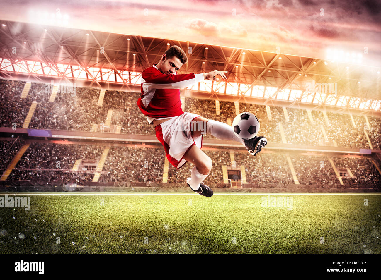 Football game at the stadium Stock Photo - Alamy