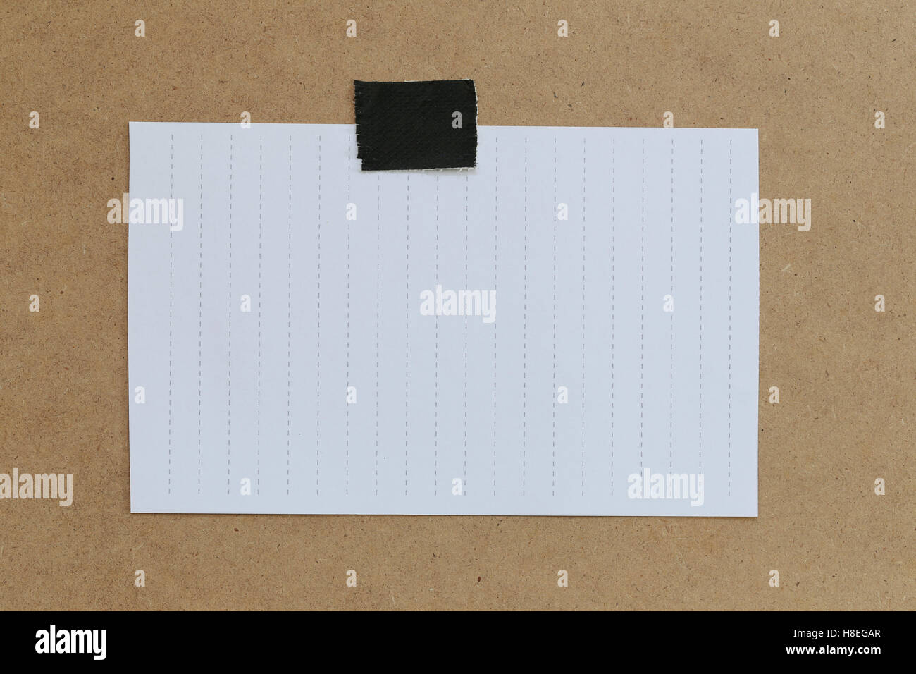 vintage of note paper on brown background and copy specs you can input ...
