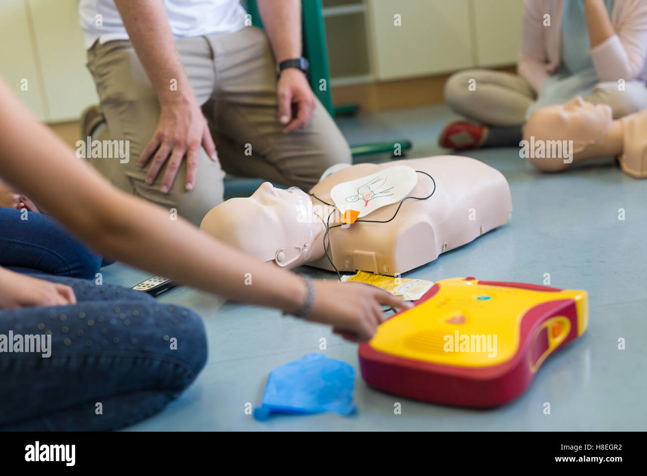 School Children With Resuscitation Doll High Resolution Stock ...