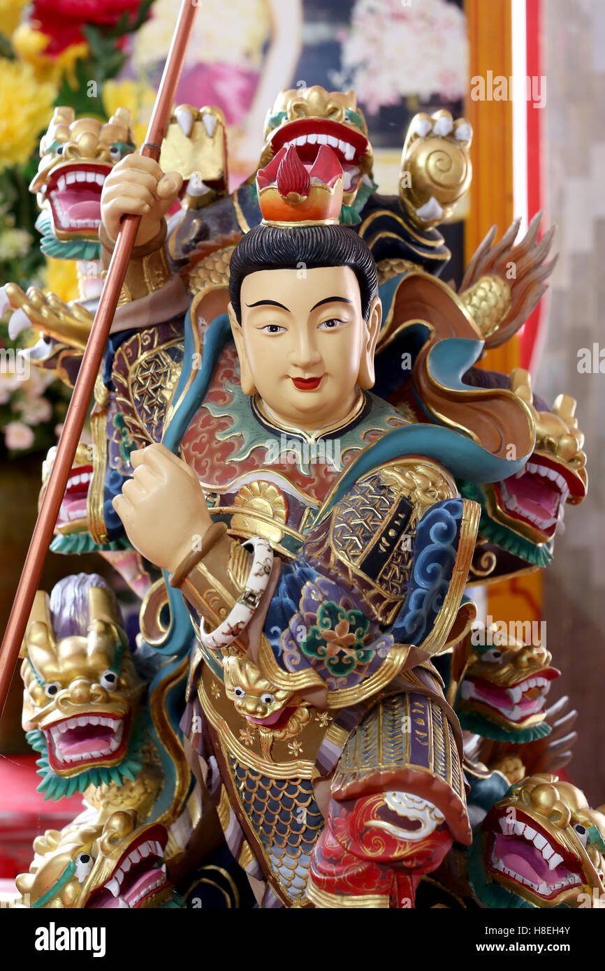Closeup Chinese god statue in the temple Stock Photo - Alamy