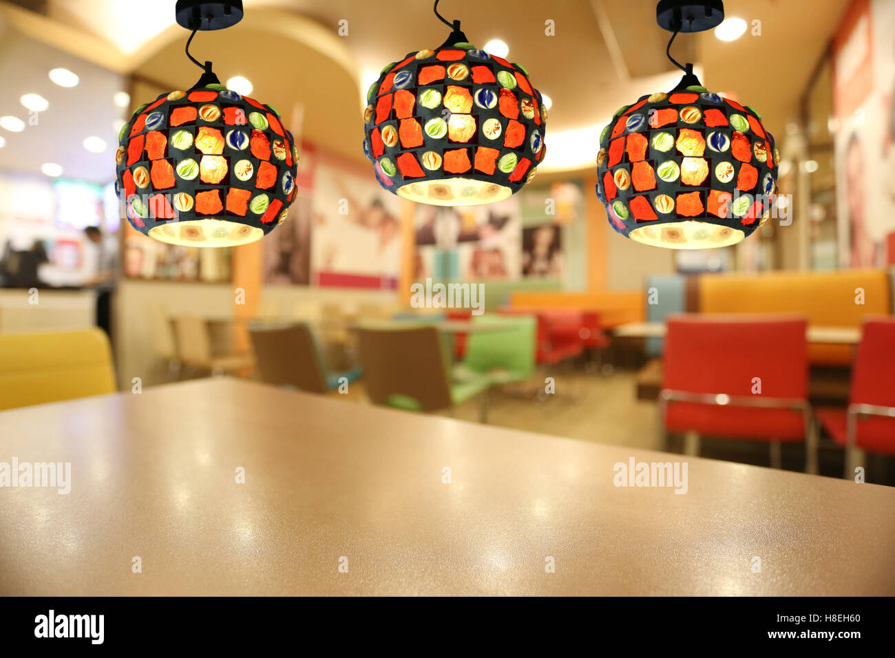 Warm lighting modern ceiling lamps in the cafe and interior decoration ...