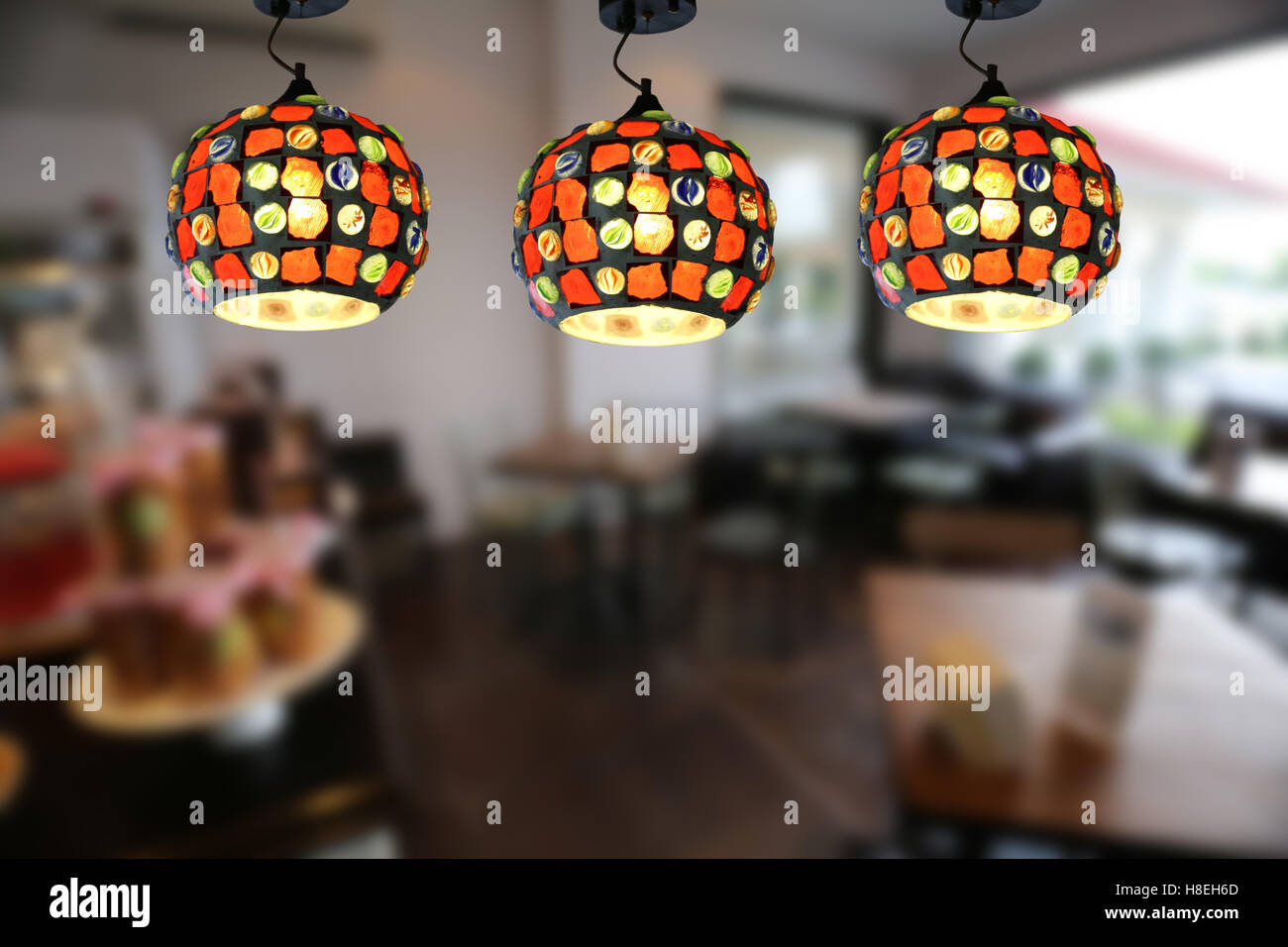 Warm lighting modern ceiling lamps in the cafe and interior decoration ...
