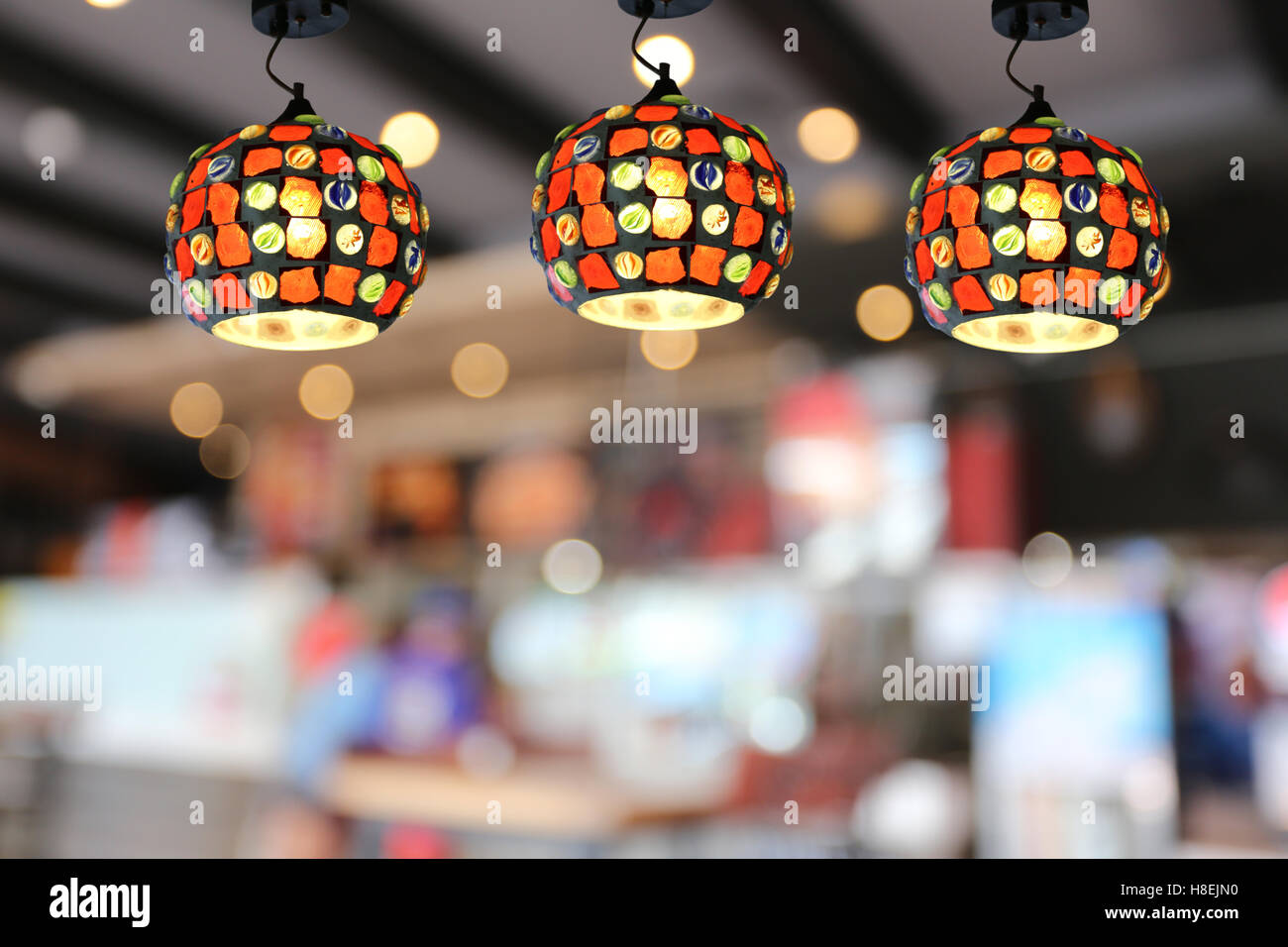 Warm lighting modern ceiling lamps in the cafe and interior decoration ...