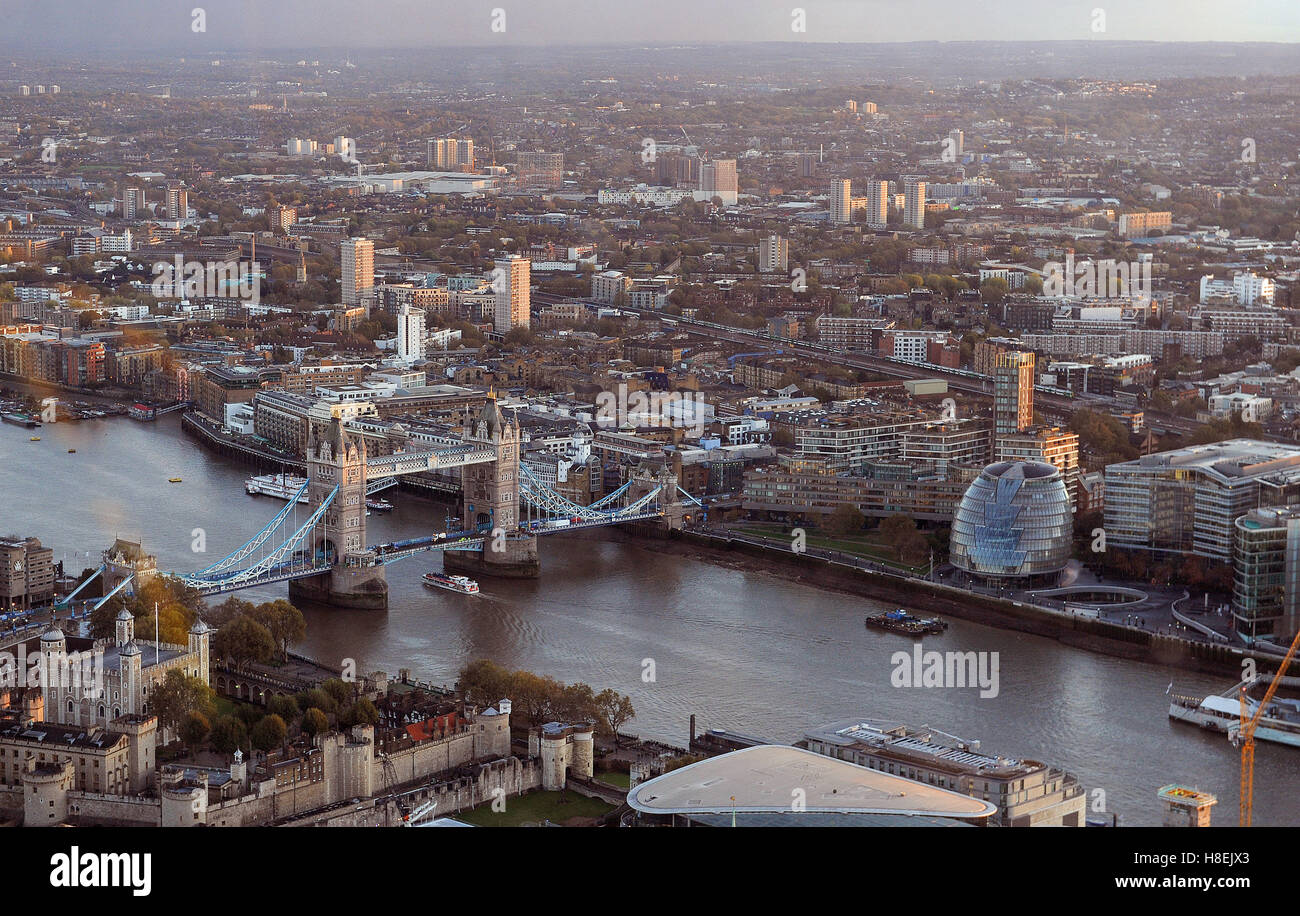 A view across London of the Tower of London (bottom left) Tower Bridge ...
